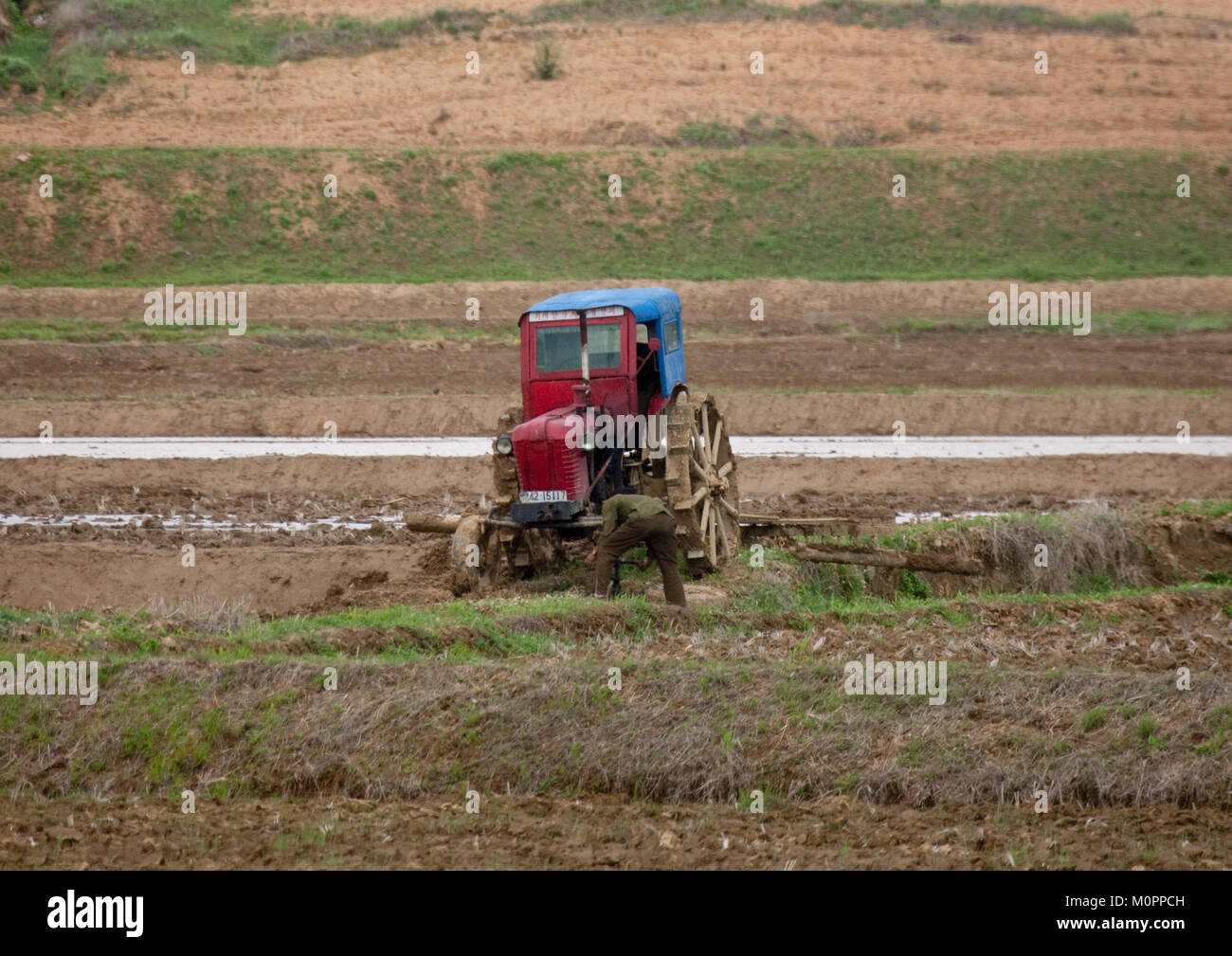 Old North Korean tractor in a field in the countryside, Pyongan ...