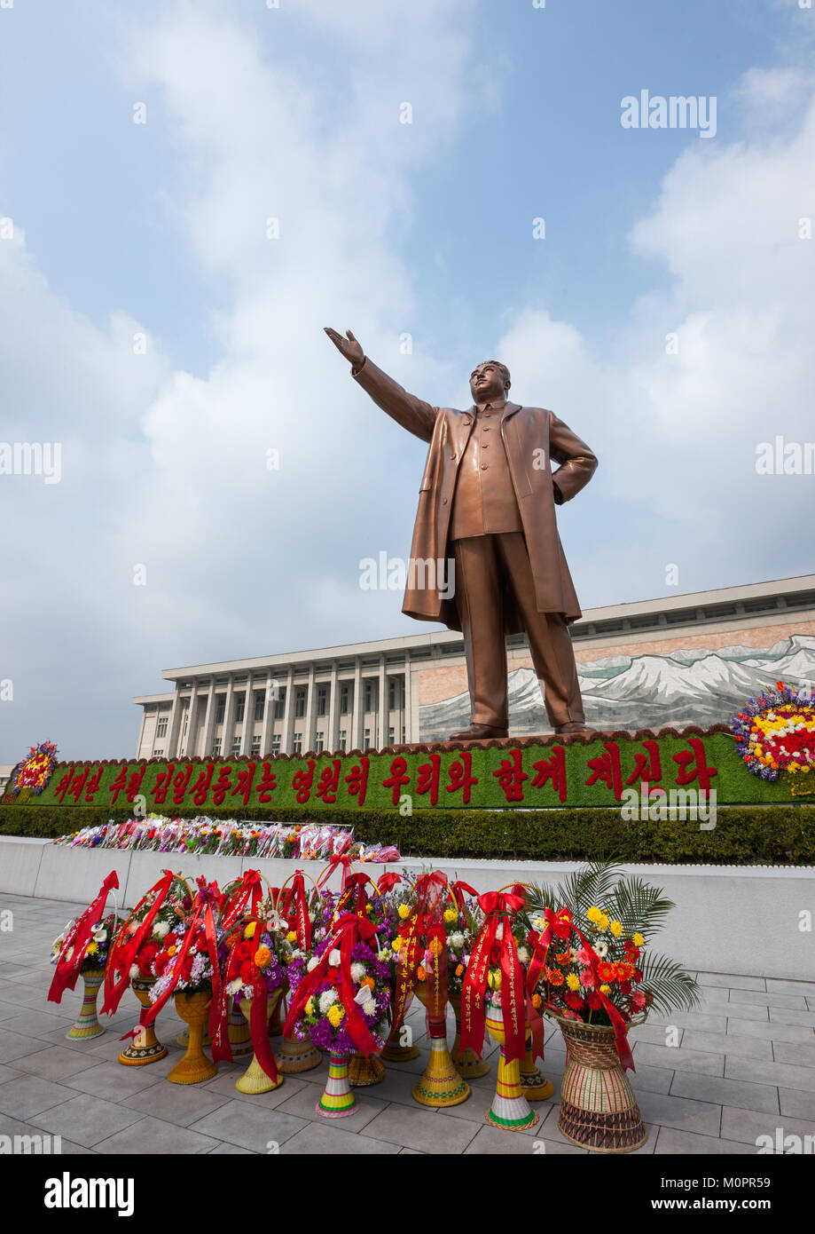 Flowers in front of Kim il Sung statue in Mansudae Grand monument ...