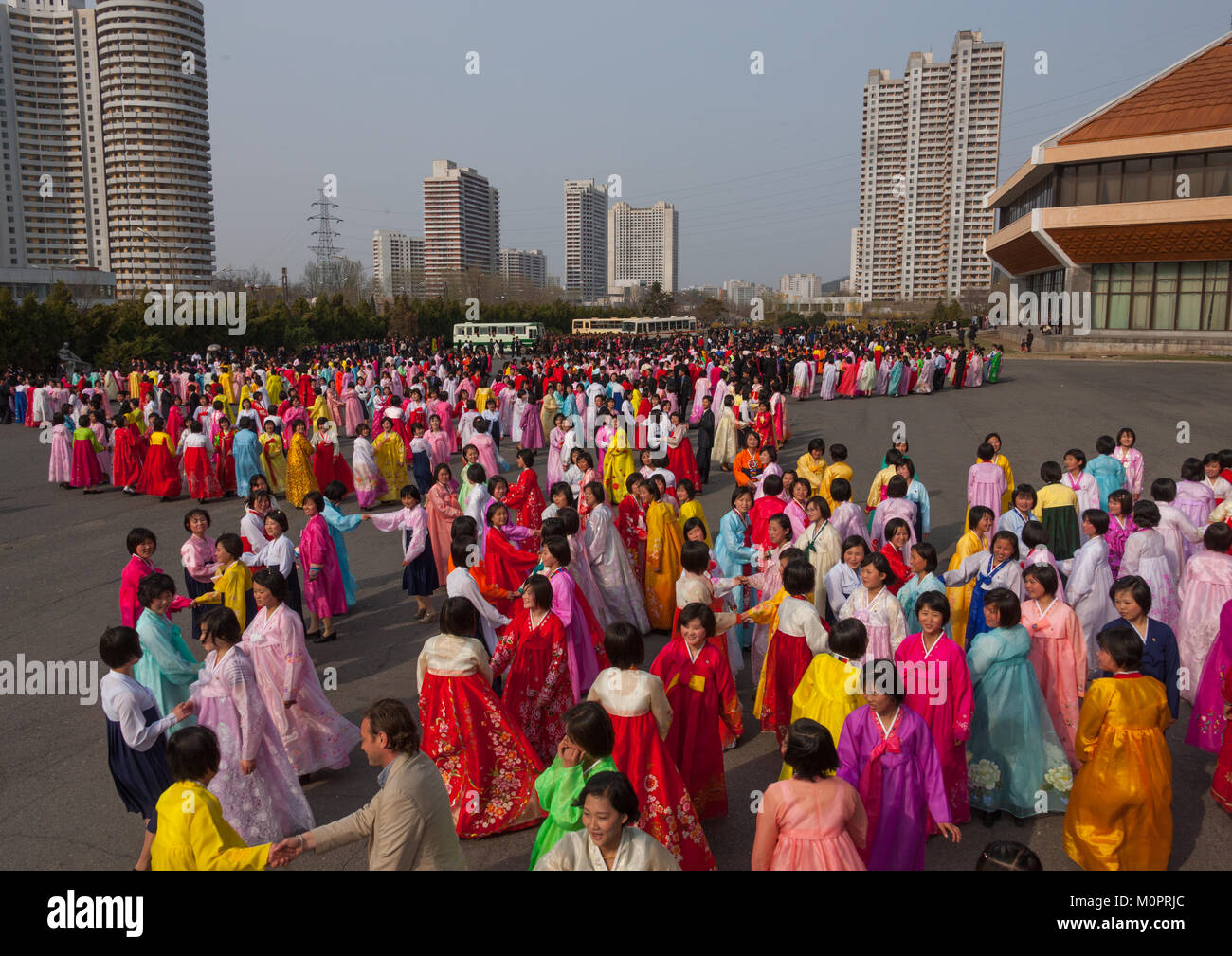 North Korean young adults during a mass dance performance in front of ...