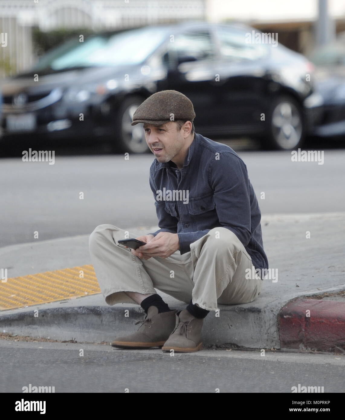 EXCLUSIVE Actor Giovanni Ribisi sitting on the curb while waiting for ...
