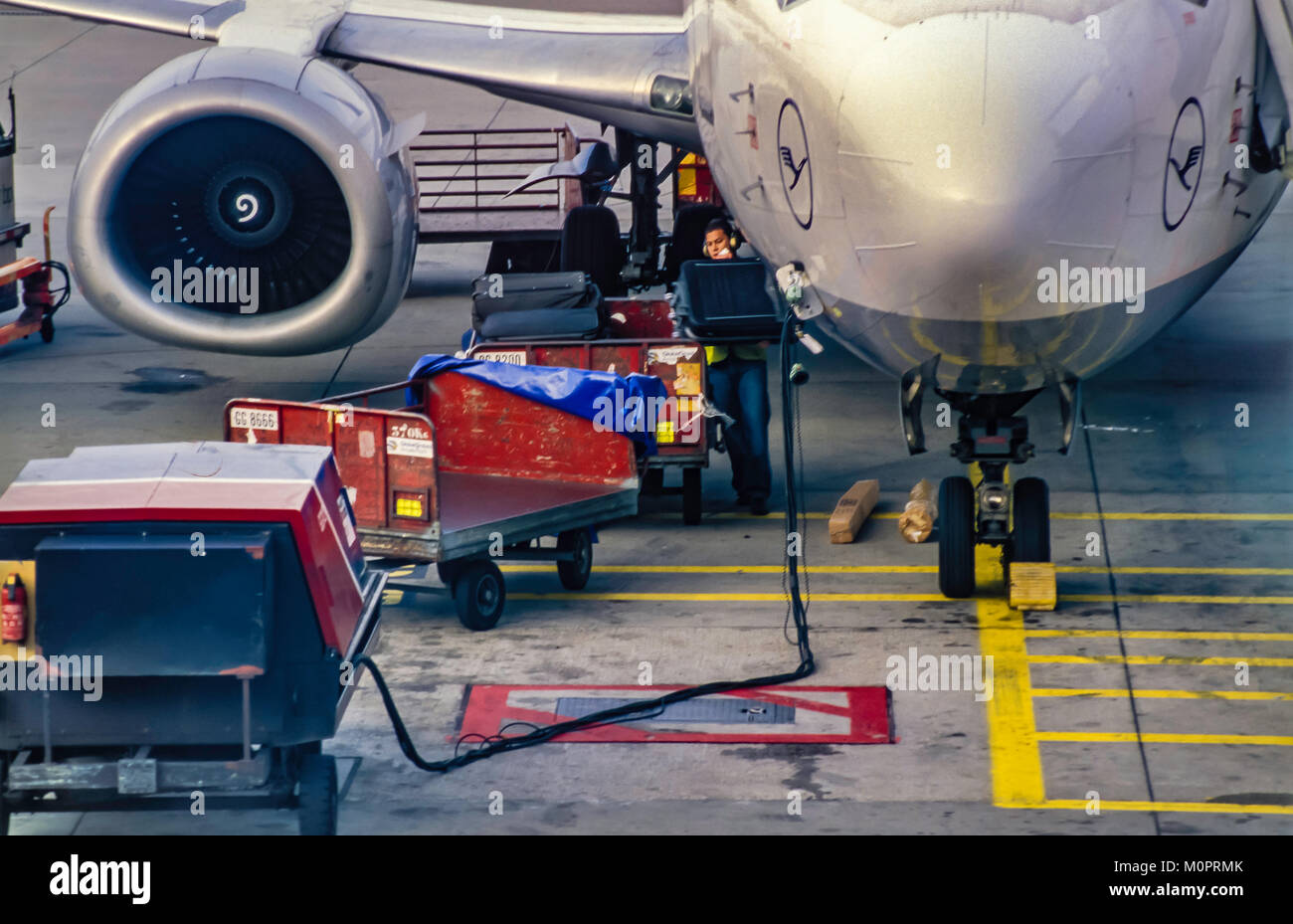Jet airplanes on airport tarmac prepare for takeoff Stock Photo - Alamy