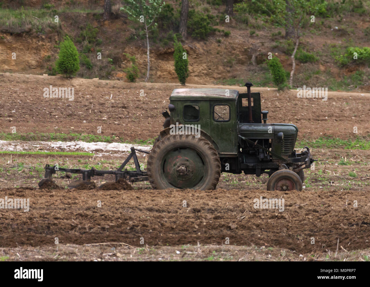 Old North Korean tractor in a field in the countryside, Pyongan ...