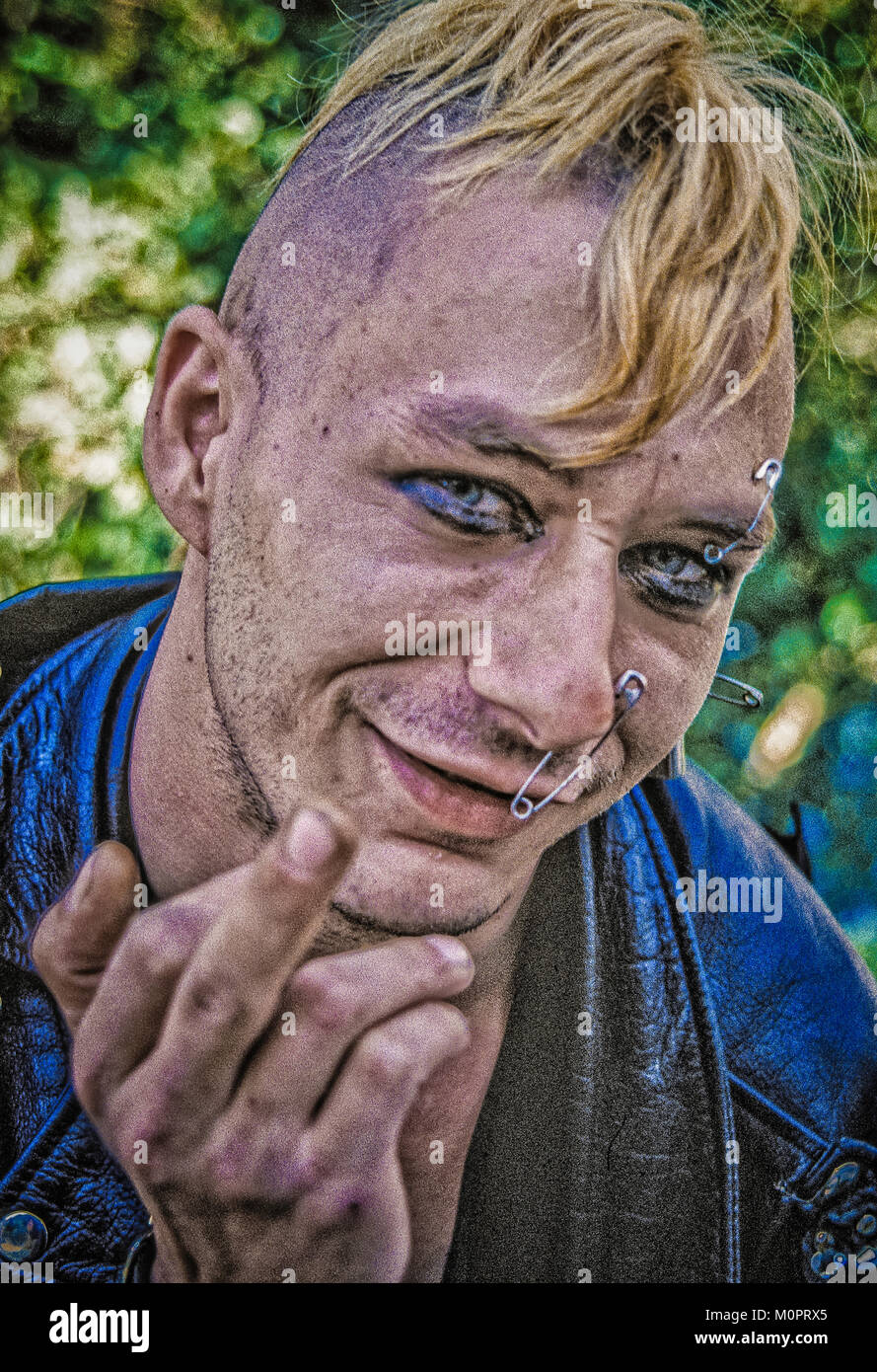 European, German punk, skin head makes gesture Stock Photo - Alamy