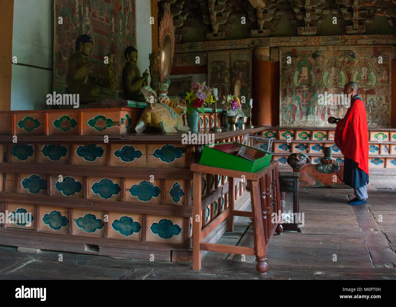 North Korean buddhist monk praying in kaesin sa temple on mount Chilbo ...