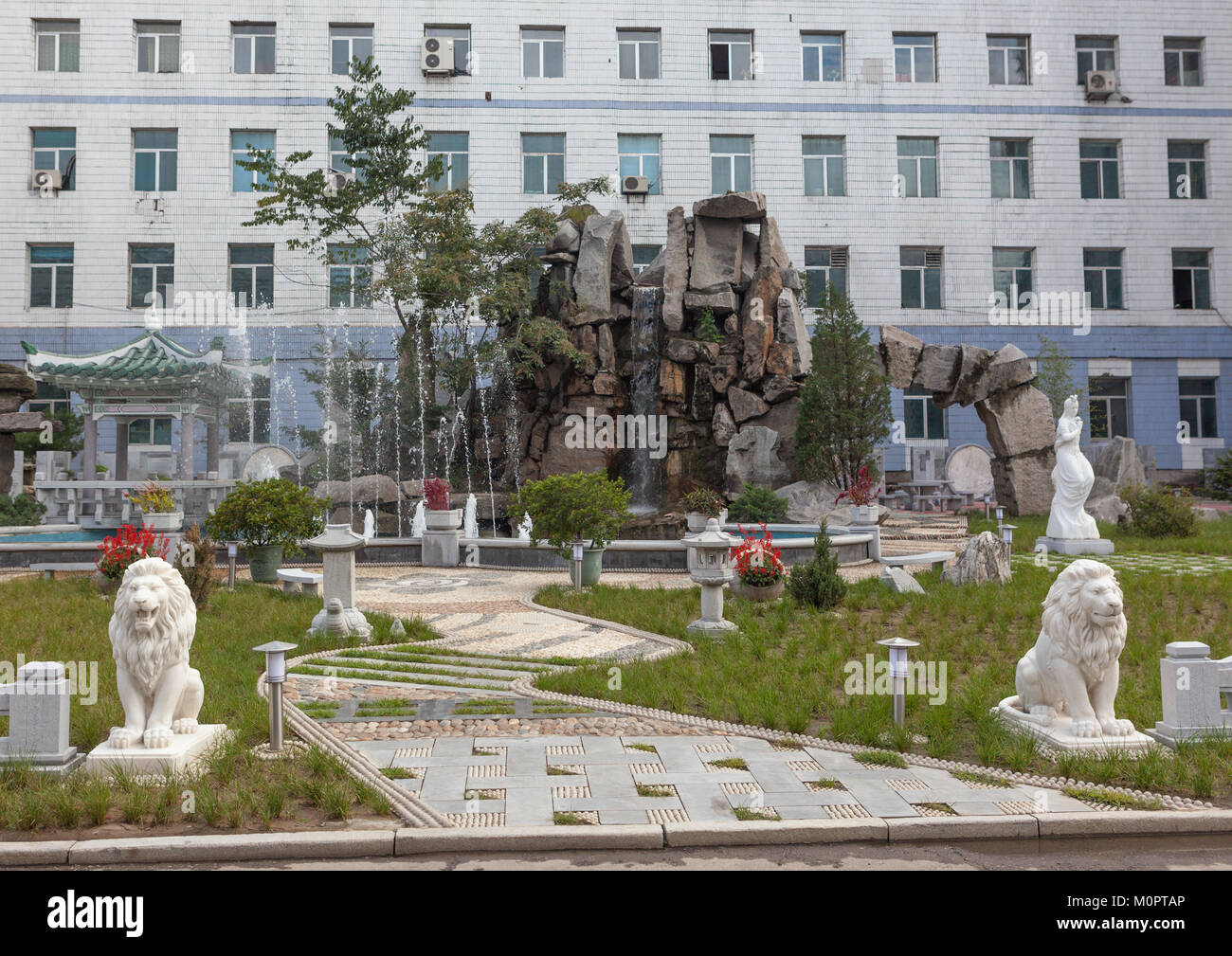 Fountain in a small park with lion statues, Pyongan Province, Pyongyang ...