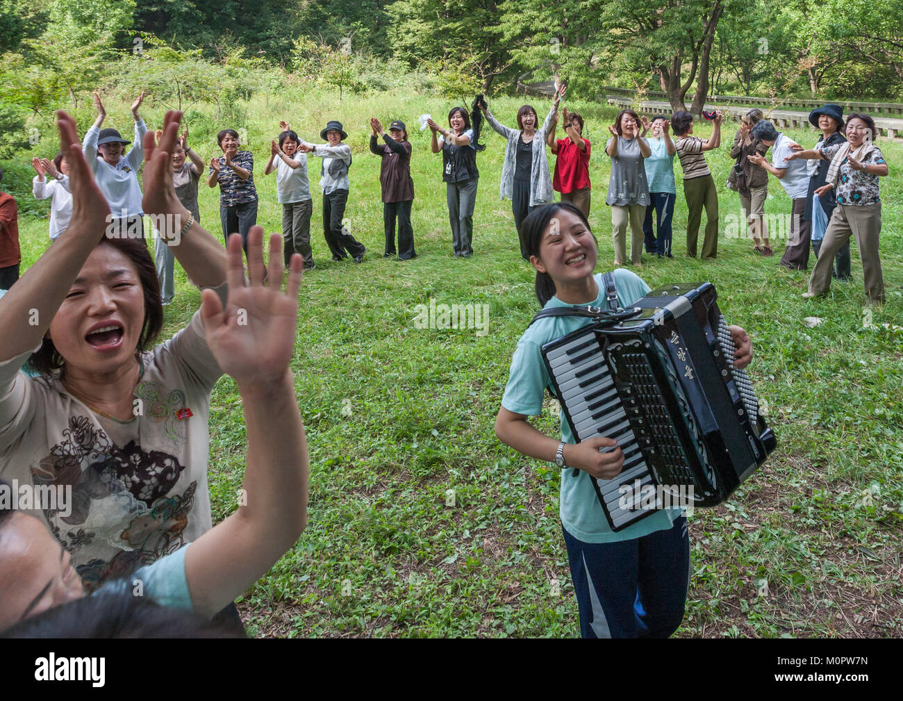 Japanese people originated from North Korea having fun in a park, North ...