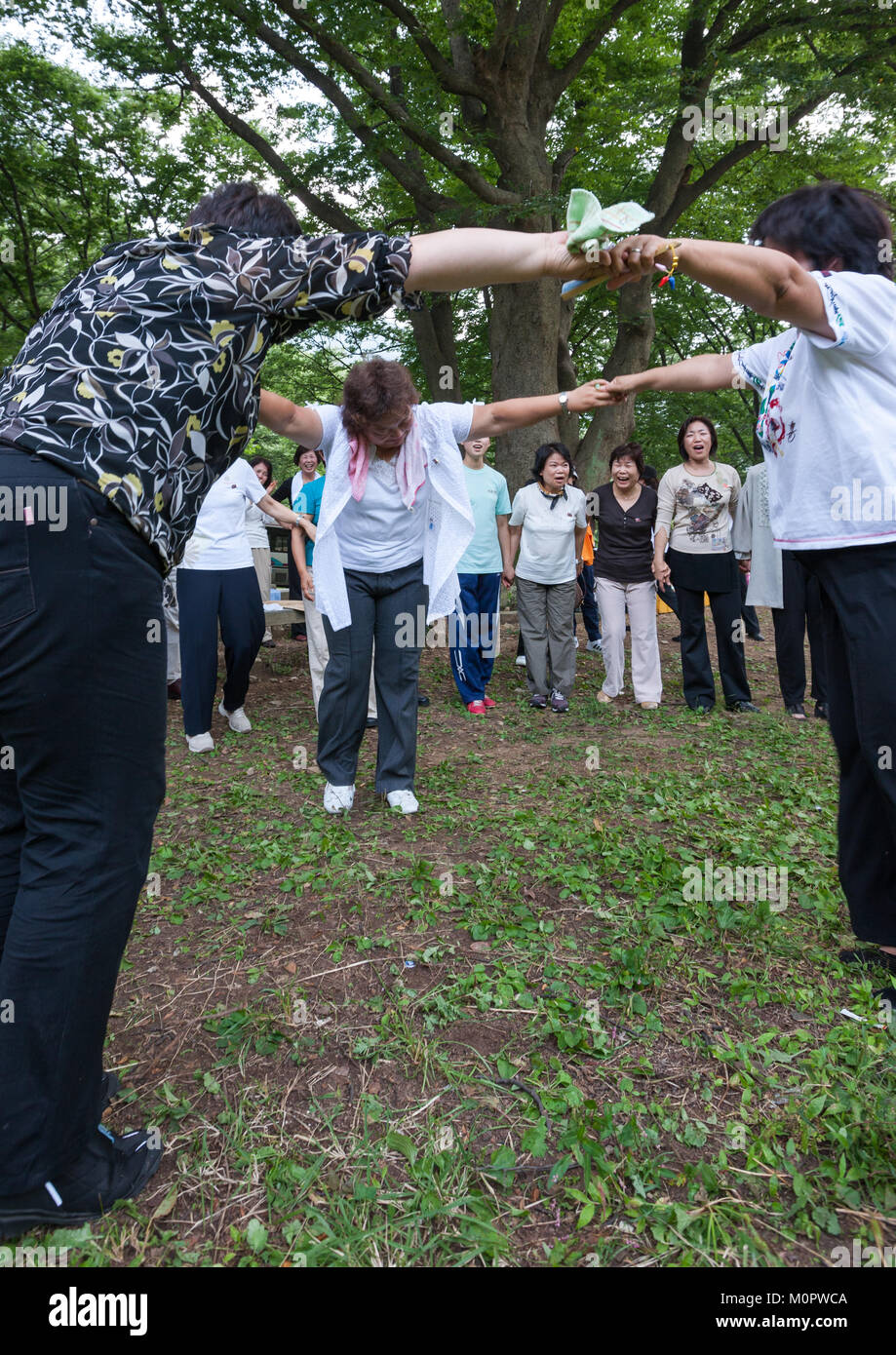 Japanese people originated from North Korea having fun in a park, North ...