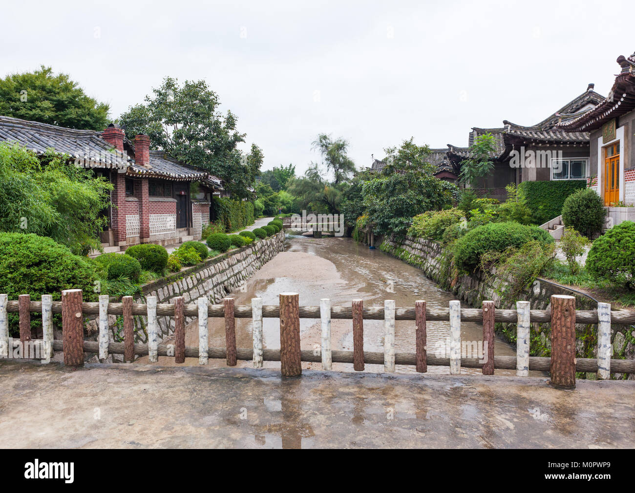 River crossing old traditional Korean houses in the folk hotel, North ...