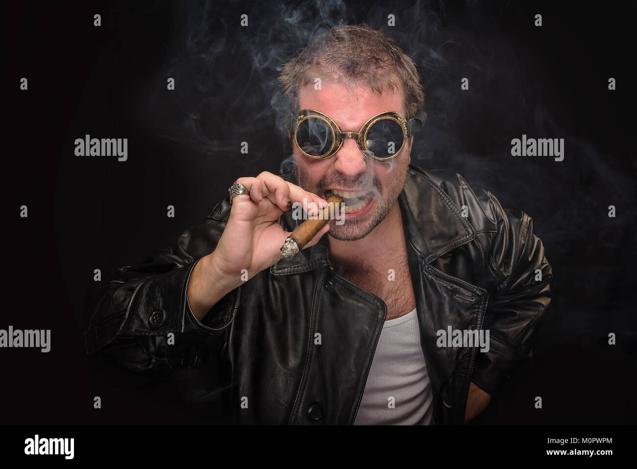 Cigar smoker young hi-res stock photography and images - Alamy