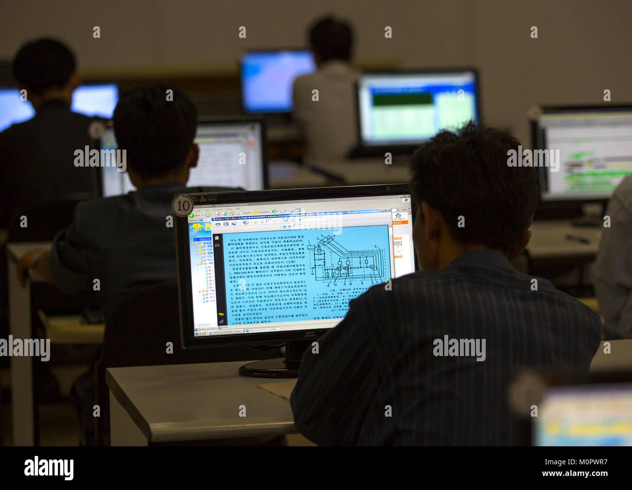 North Korean students using intranet in the computer room of the Grand ...