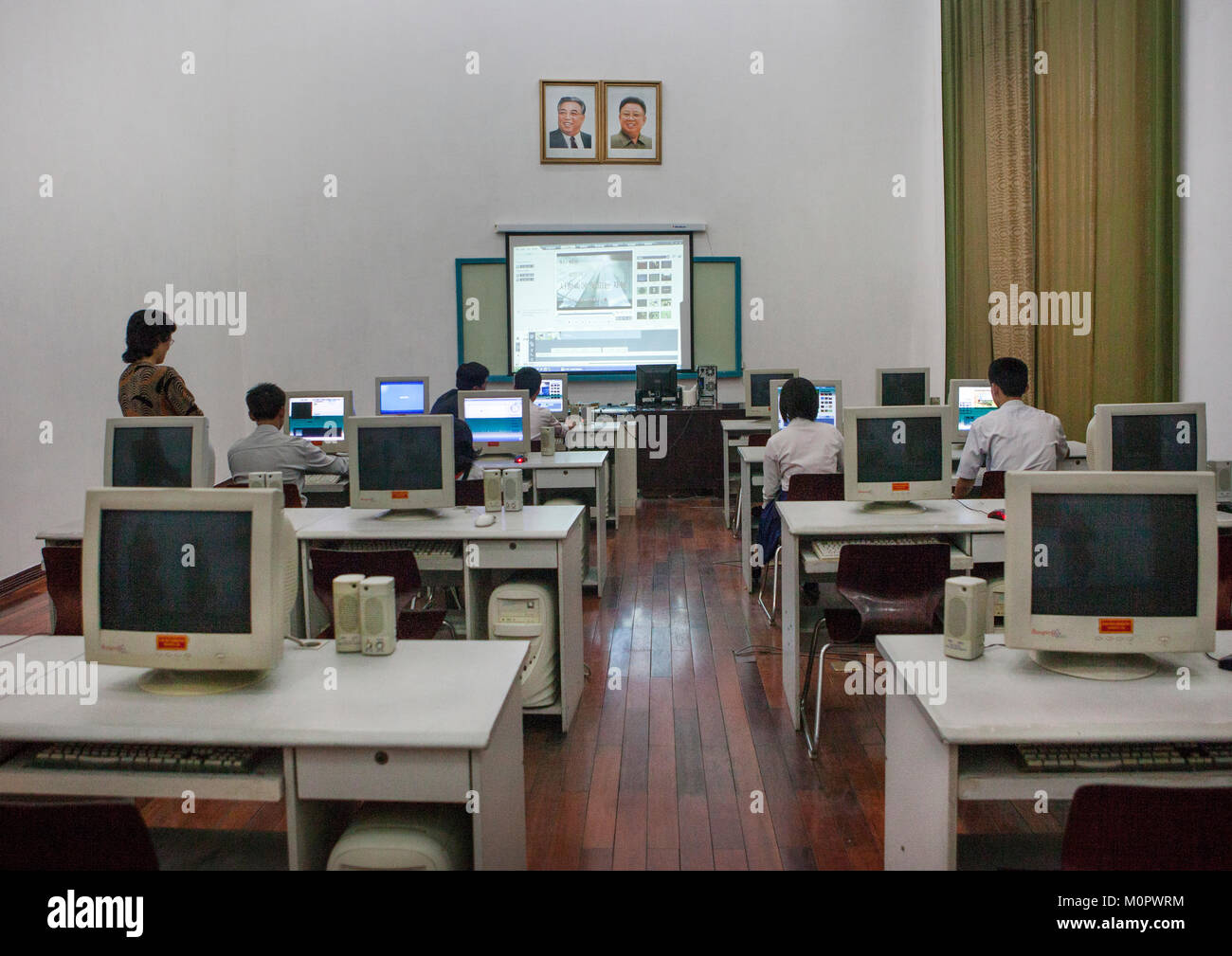 North Korean girl in a video editing school in Mangyongdae children's ...