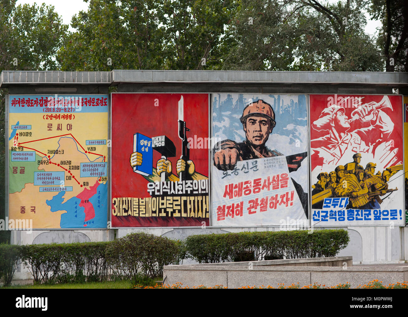 Row of propaganda billboards in the street, Pyongan Province, Pyongyang ...