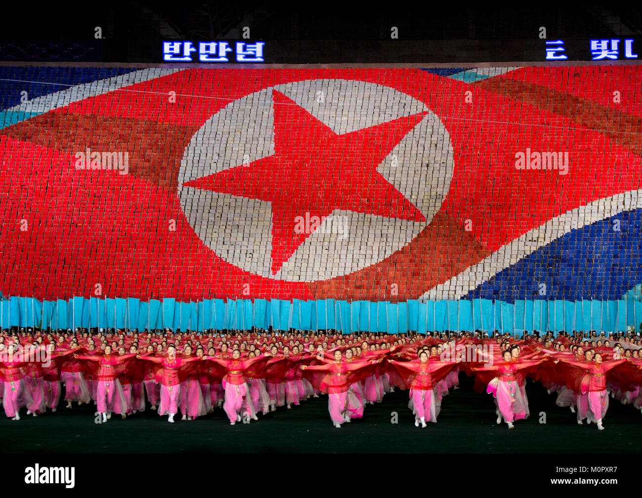 North Korean flag made by human pixels holding up colored boards during ...