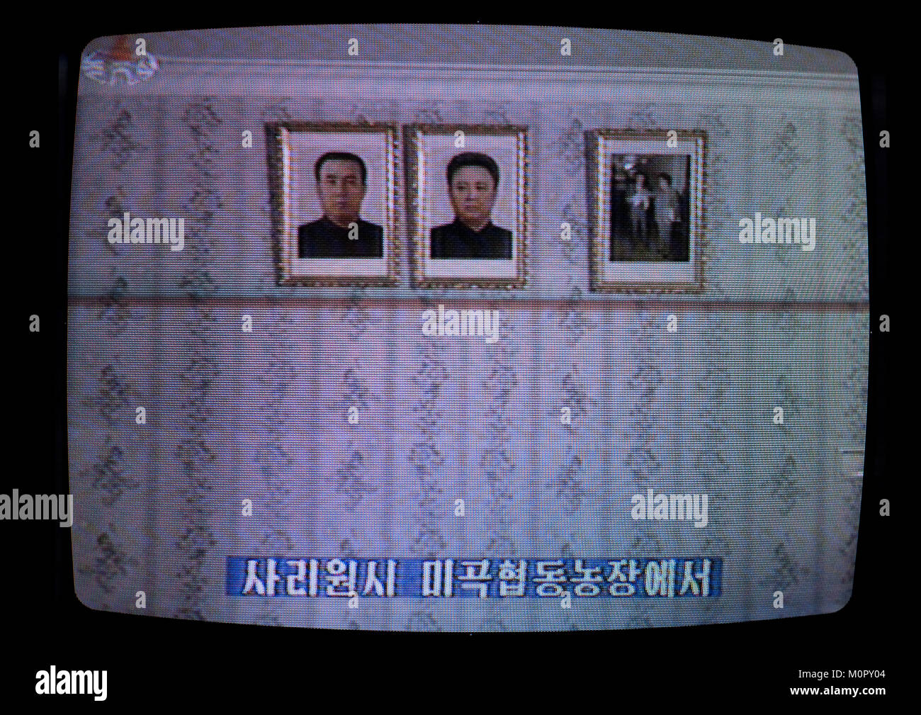 Portraits of the Dear Leaders on the North Korean television, Pyongan ...