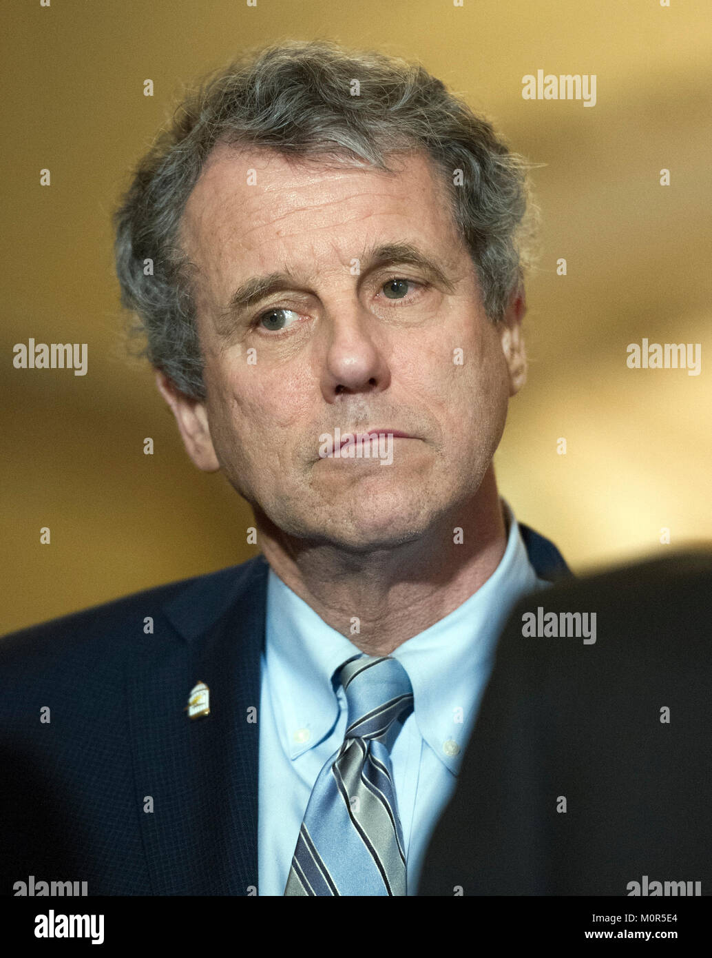 United States Senator Sherrod Brown (Democrat of Ohio) listens to ...