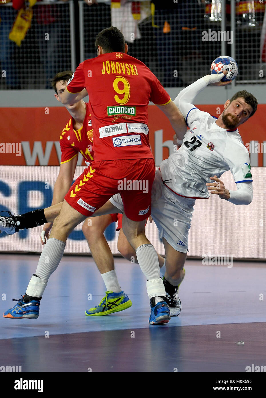 Macedonia's Filip Taleski (L, covered) and Ace Jonovski and the Czech ...