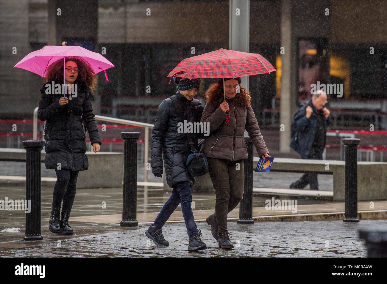 Southbank, London. 24th Jan, 2018. Wet wintry weather makes life ...
