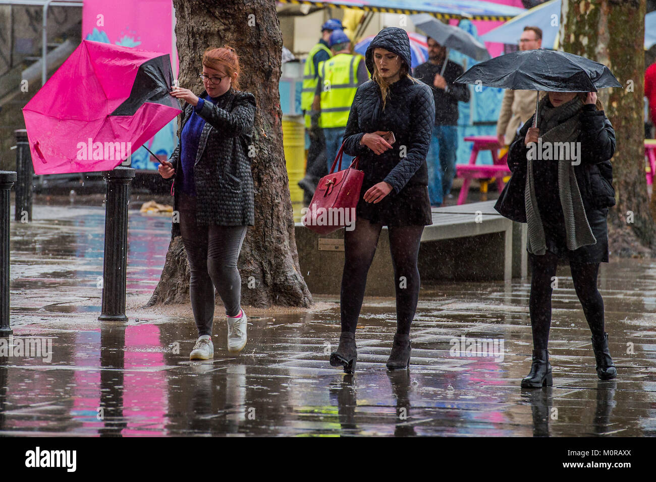 Southbank, London. 24th Jan, 2018. Wet wintry weather makes life ...