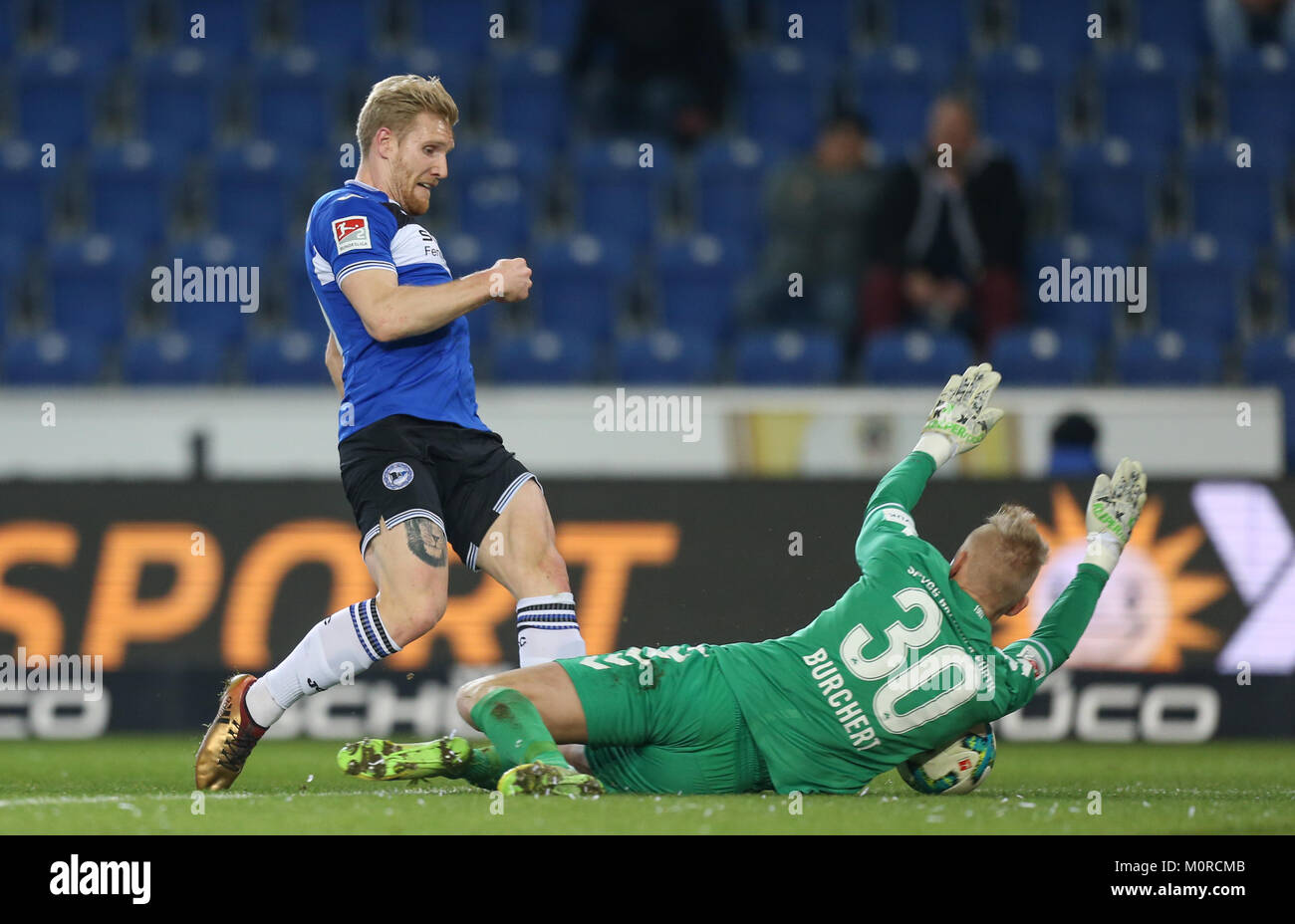 Bielefeld, Germany. 24th Jan, 2018. Bielefeld's Andreas Voglsammer (L ...