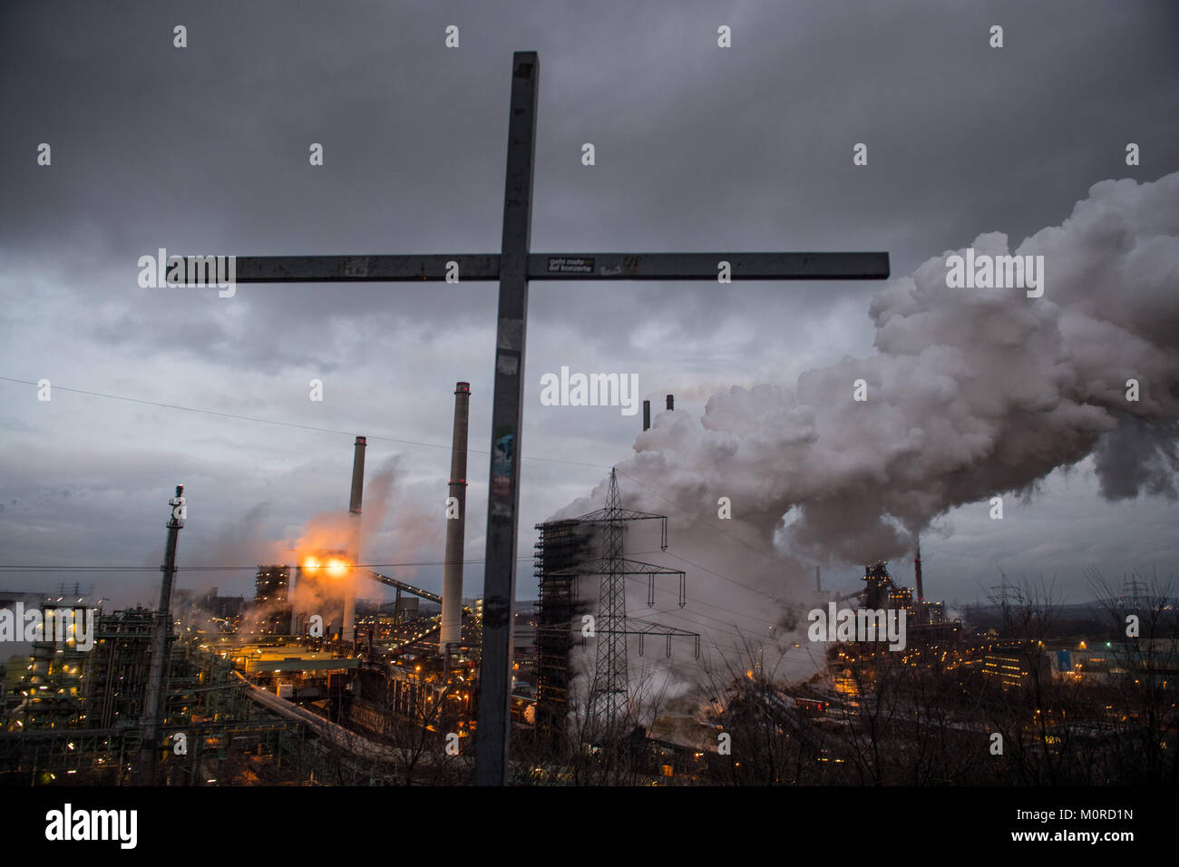 A summit cross stands on the Alsum mountain, overlooking the ...