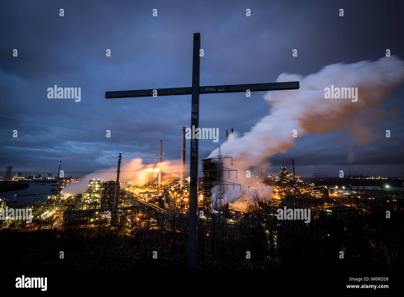 A summit cross stands on the Alsum mountain, overlooking the ...