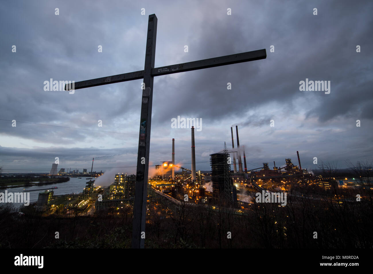 A summit cross stands on the Alsum mountain, overlooking the ...