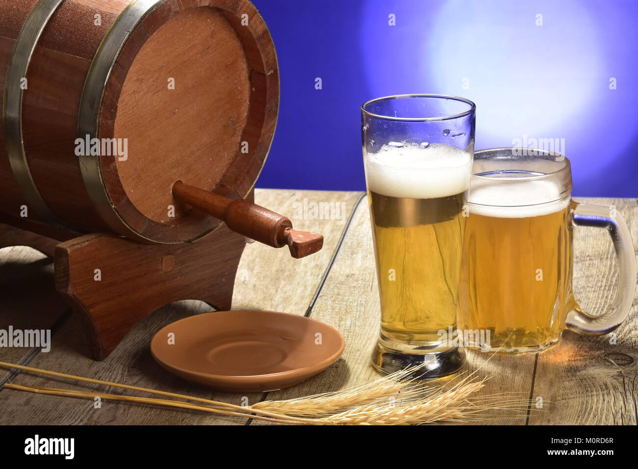 Beer Photo concept in blue background Stock Photo - Alamy