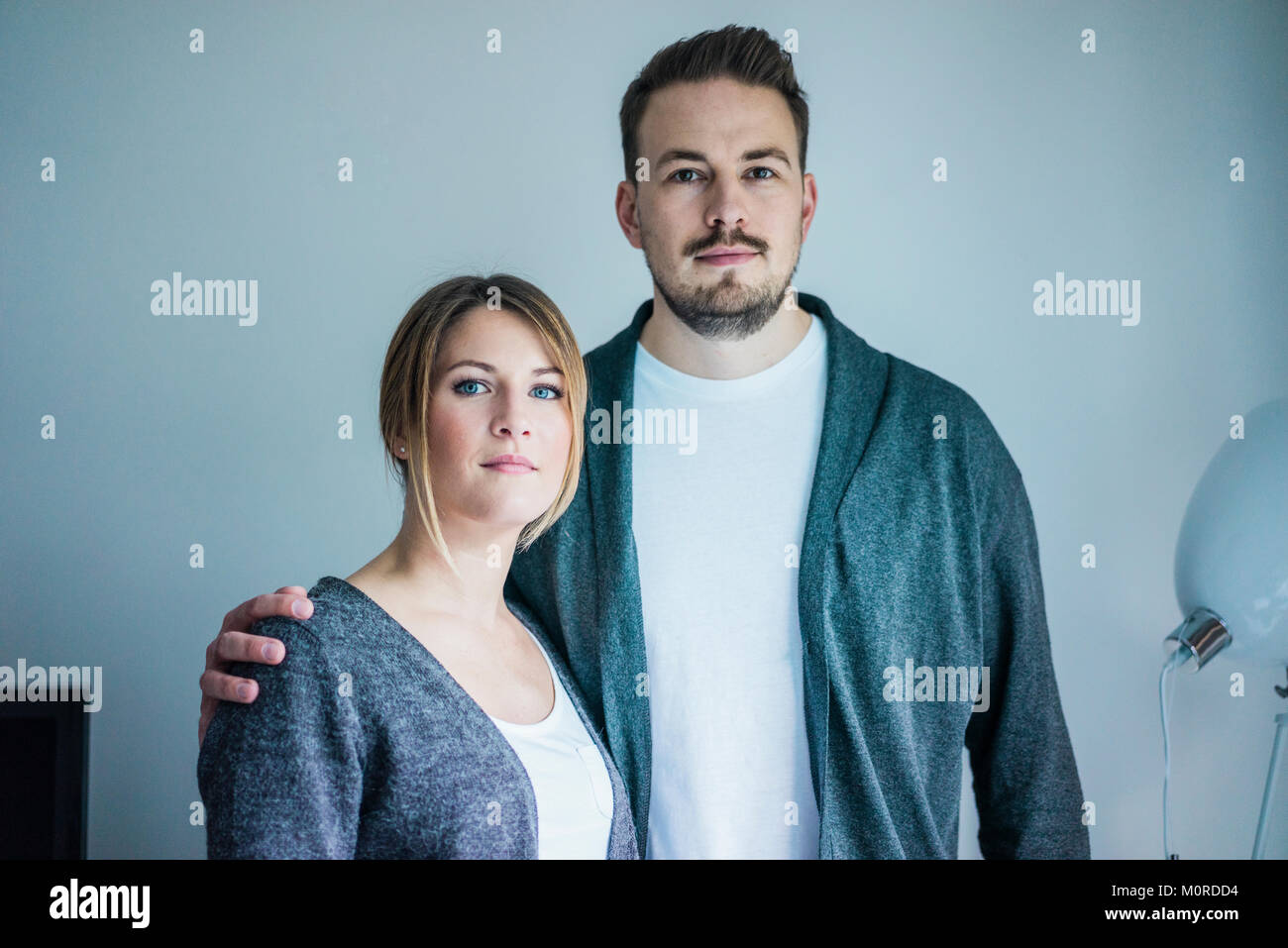 Portrait of confident couple Stock Photo - Alamy