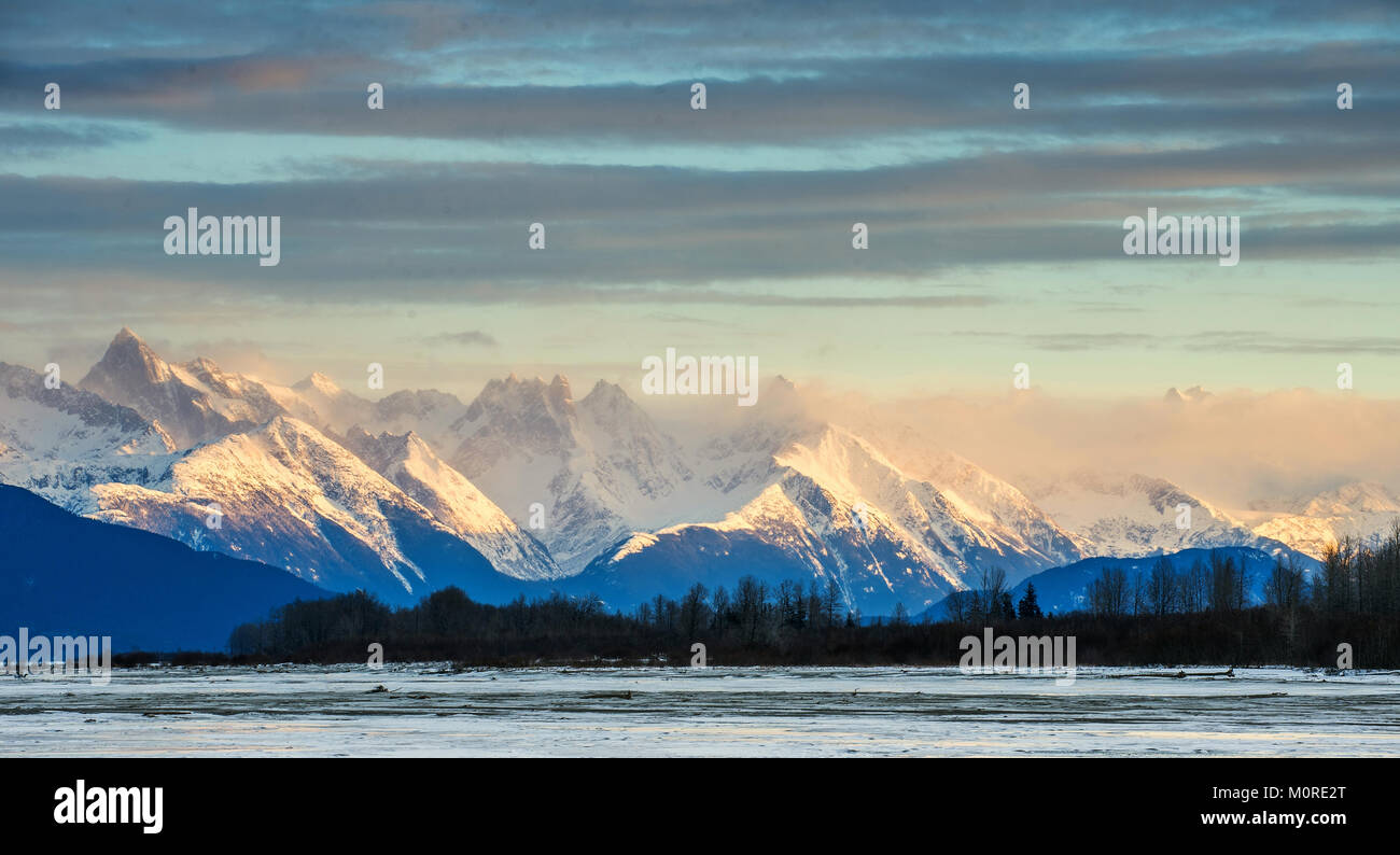 Chilkat River and Mountains in snow on a sunrise. Alaska.USA Stock ...