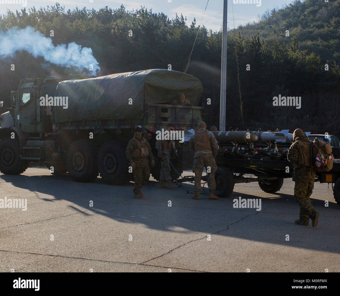 U.S. Marines Marine Aviation Logistics Squadron (MALS) 12 attach a ...
