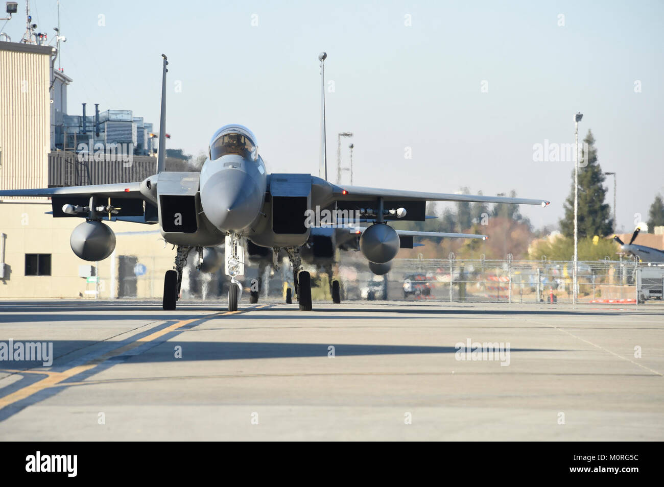 Two U.S. Air Force F-15 Eagle fighter jets from the 144th Fighter Wing ...