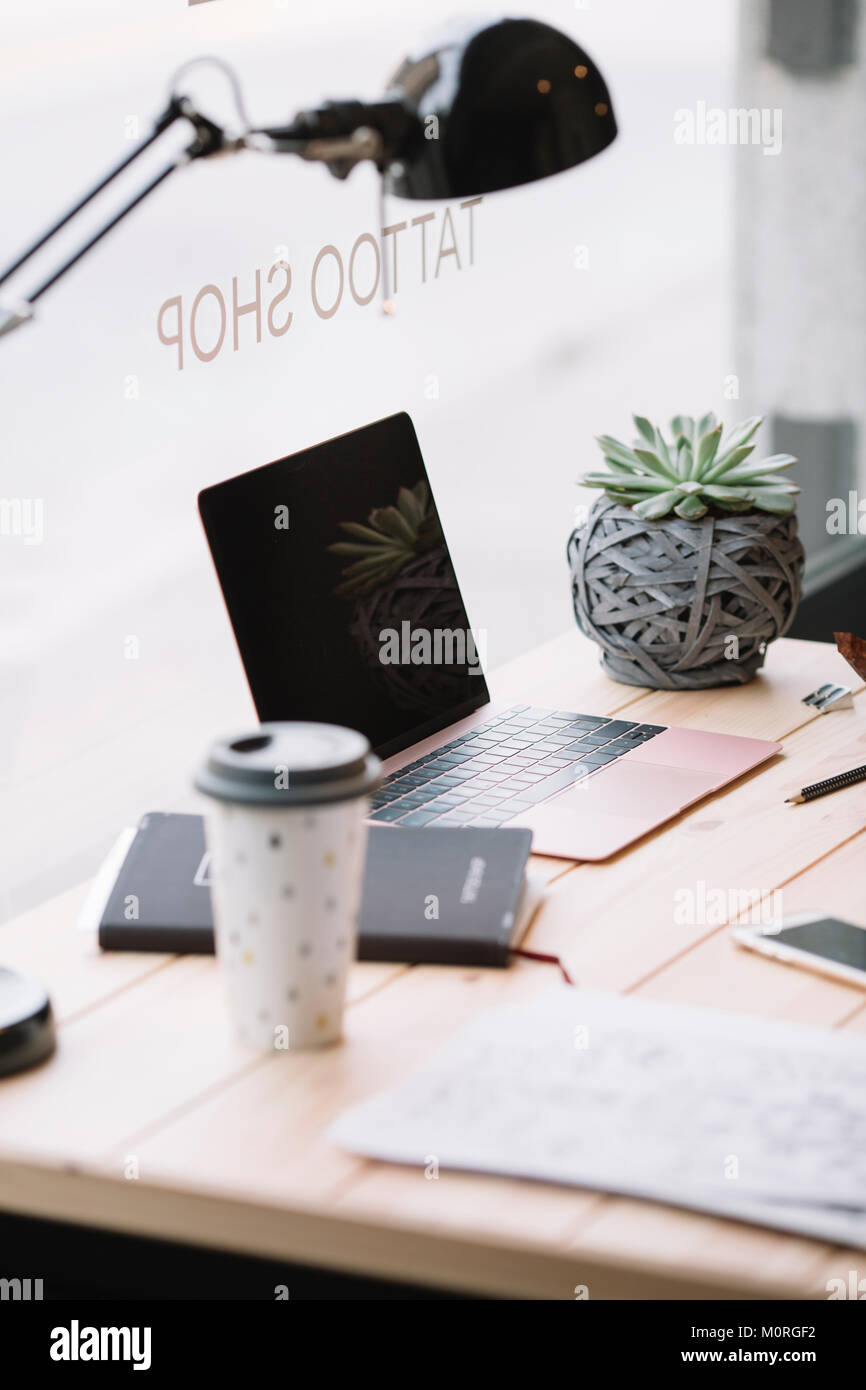 Desk in tattoo studio Stock Photo - Alamy