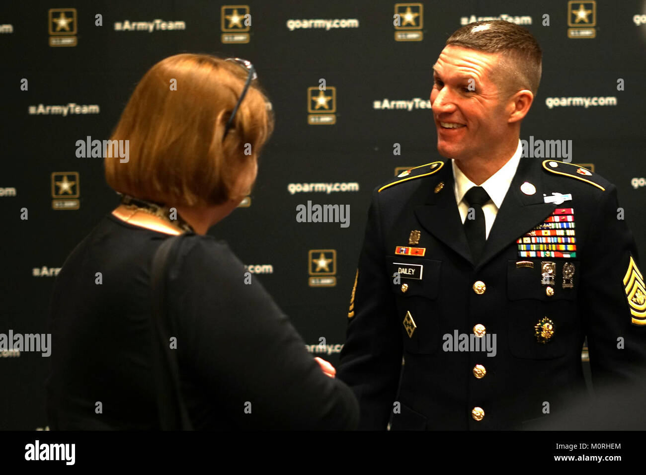 Sgt. Maj. of the Army Daniel Dailey, speaks with a center of influence ...