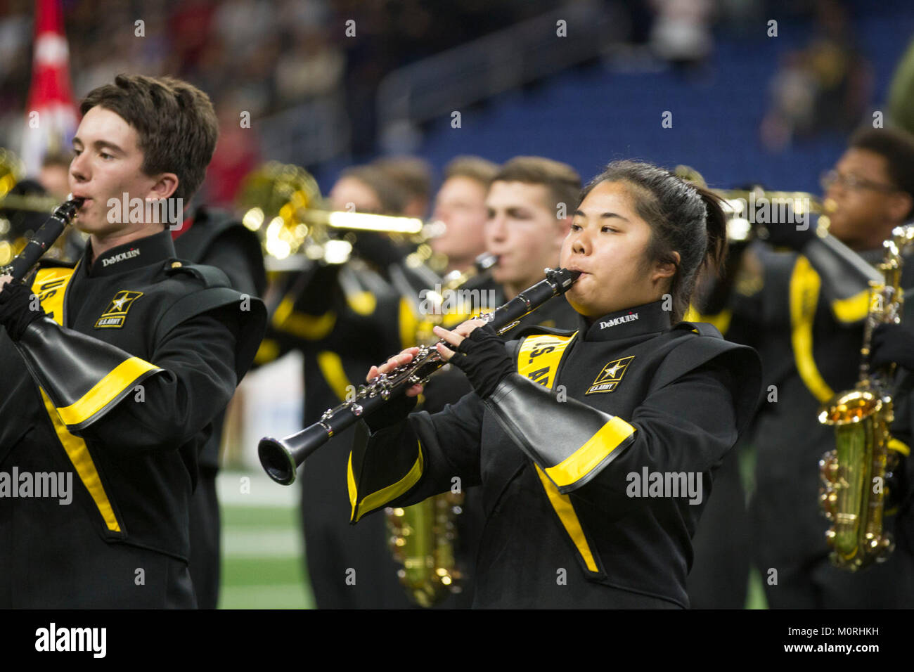 Members of the U.S. Army All-American Band perform the national anthem ...