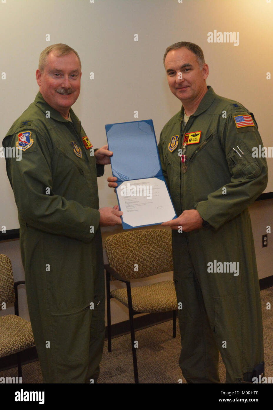 Col. Douglas E. Gullion (left), 507th Air Refueling Wing commander ...