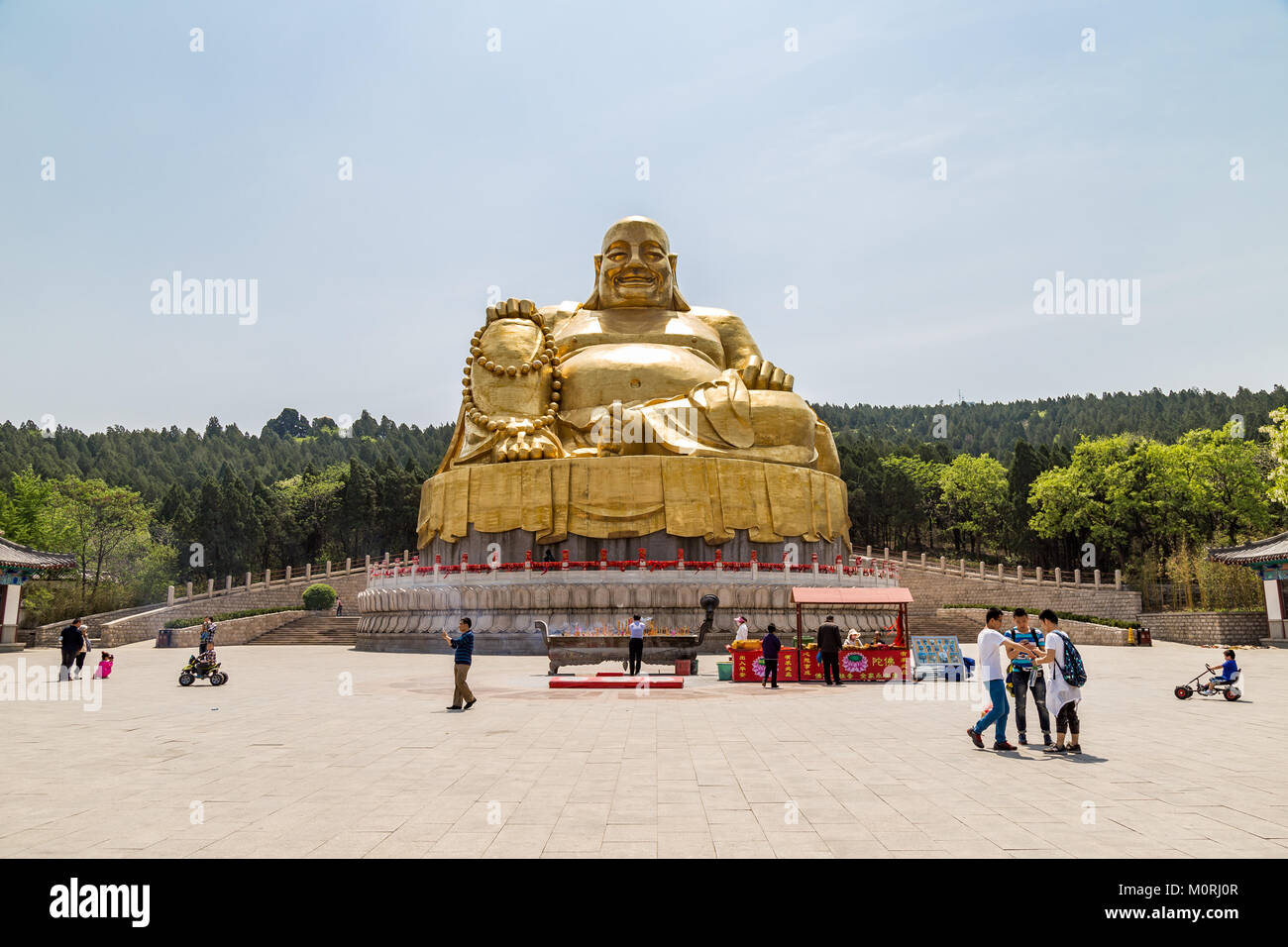 Jinan, China, April 2015 - Tourists walk in front if the Big golden ...