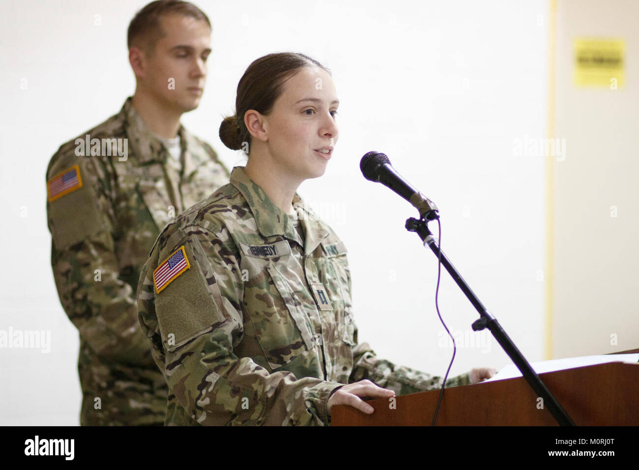 Arizona Army National Guard Capt. Kimberly C. Kennedy passes the unit ...