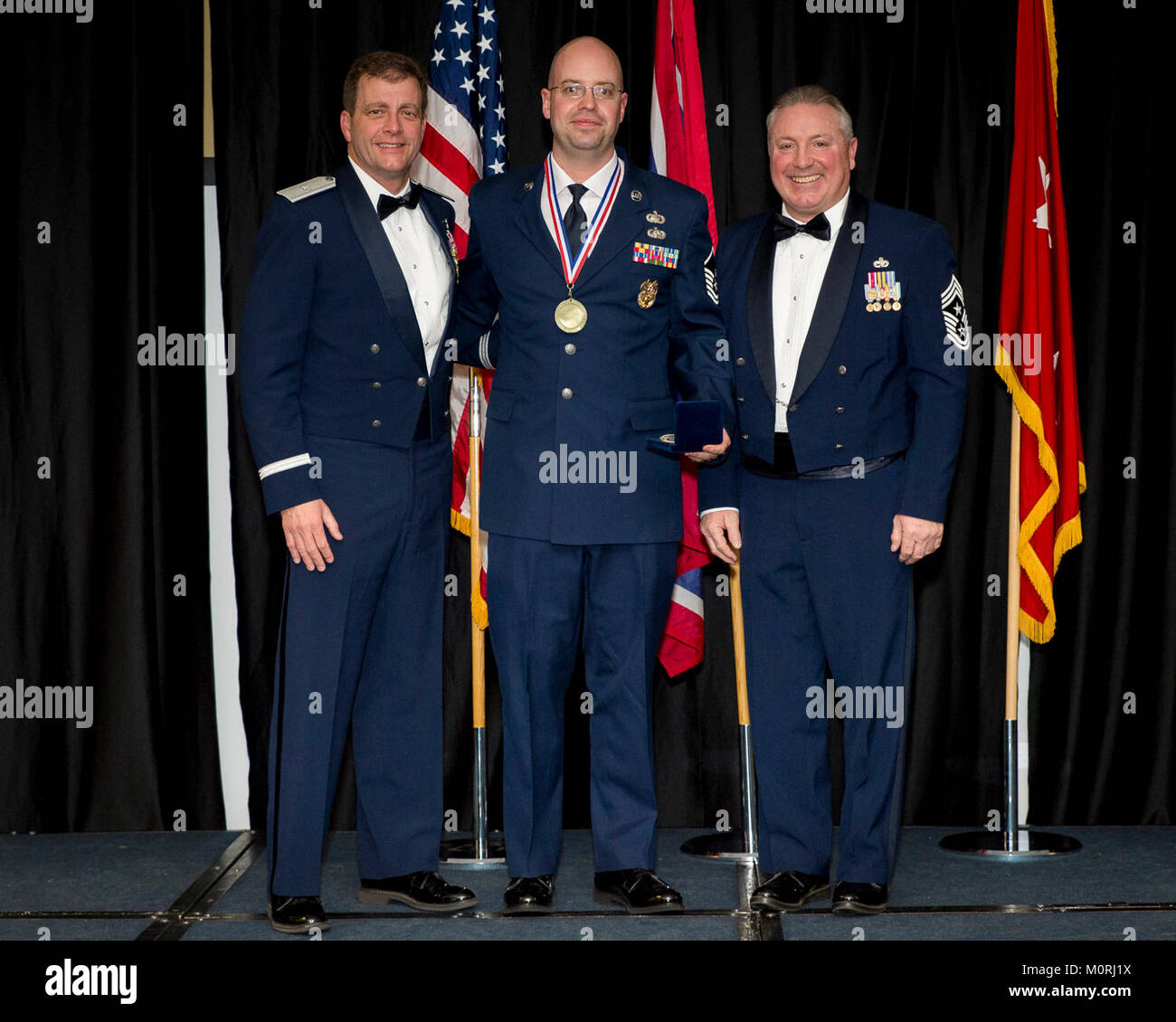 153rd Airlift Wing Master Sgt. Zachary Austin stands with Brig. Gen ...