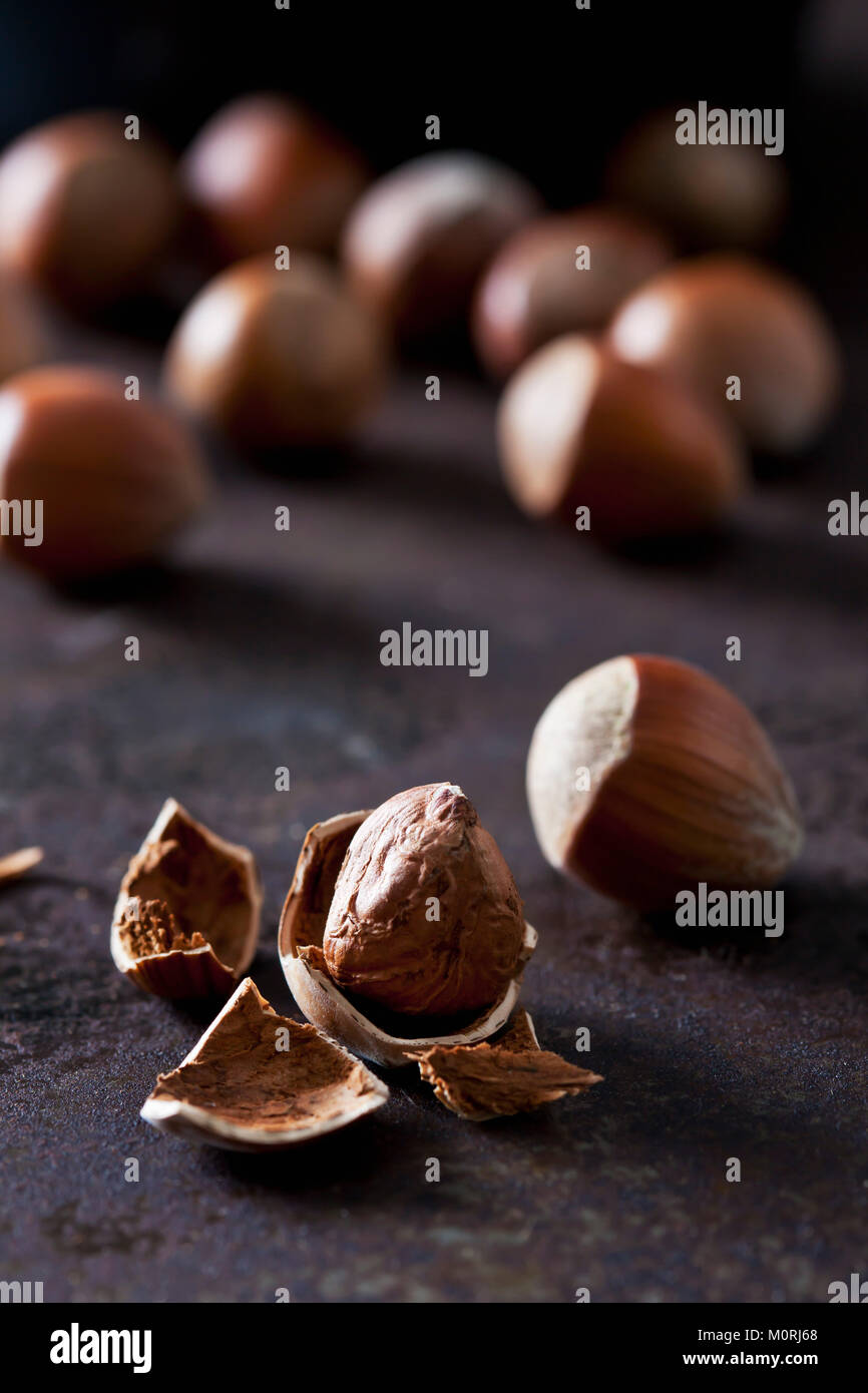 Cracked hazelnut, close-up Stock Photo - Alamy