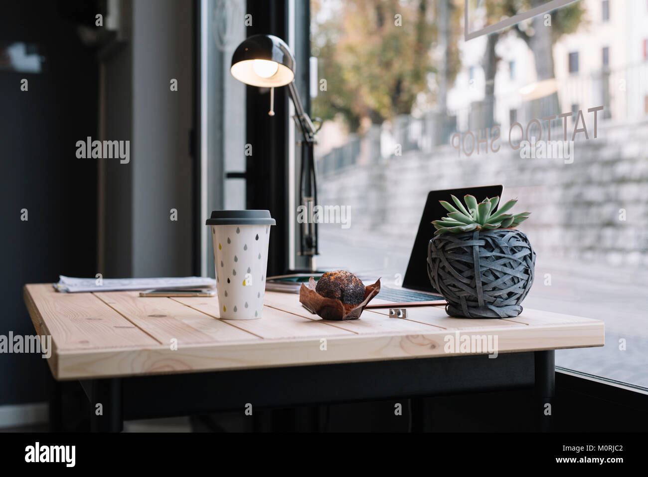 Desk in tattoo studio Stock Photo - Alamy