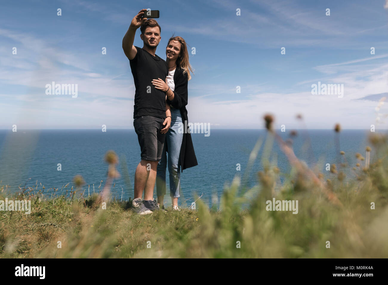 Couple photographing making selfie hi-res stock photography and images ...