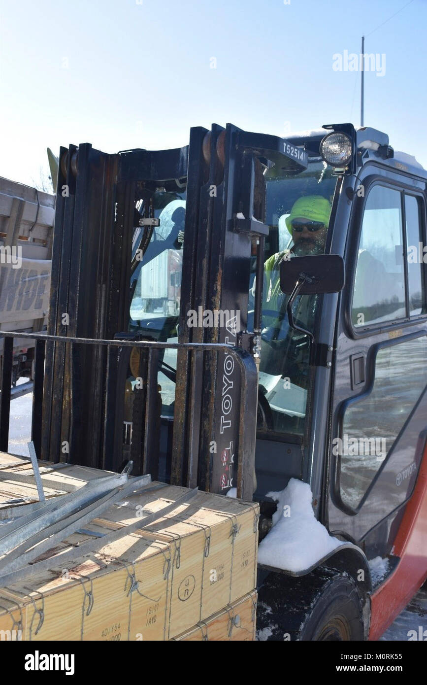 Crane Army employees work through snow, ice, sleet, and freezing ...