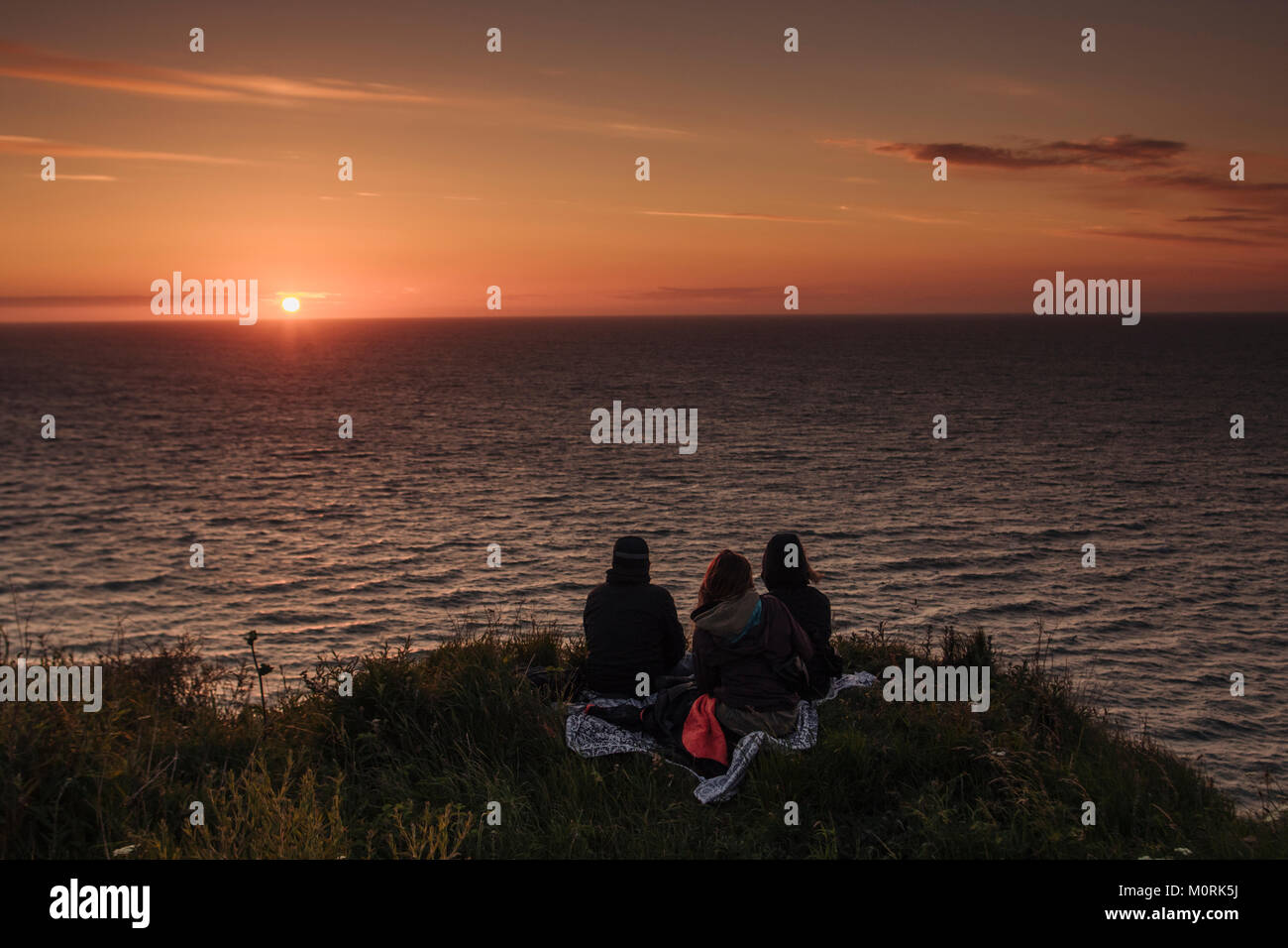 France, friends enjoying sunset Stock Photo - Alamy
