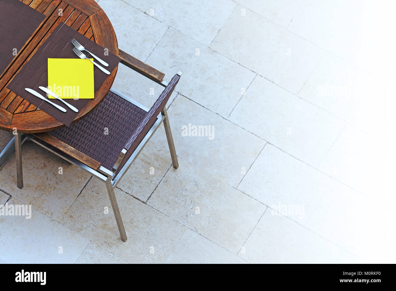 Outdoor summer cafe tables with chairs. View from above. Copy space ...