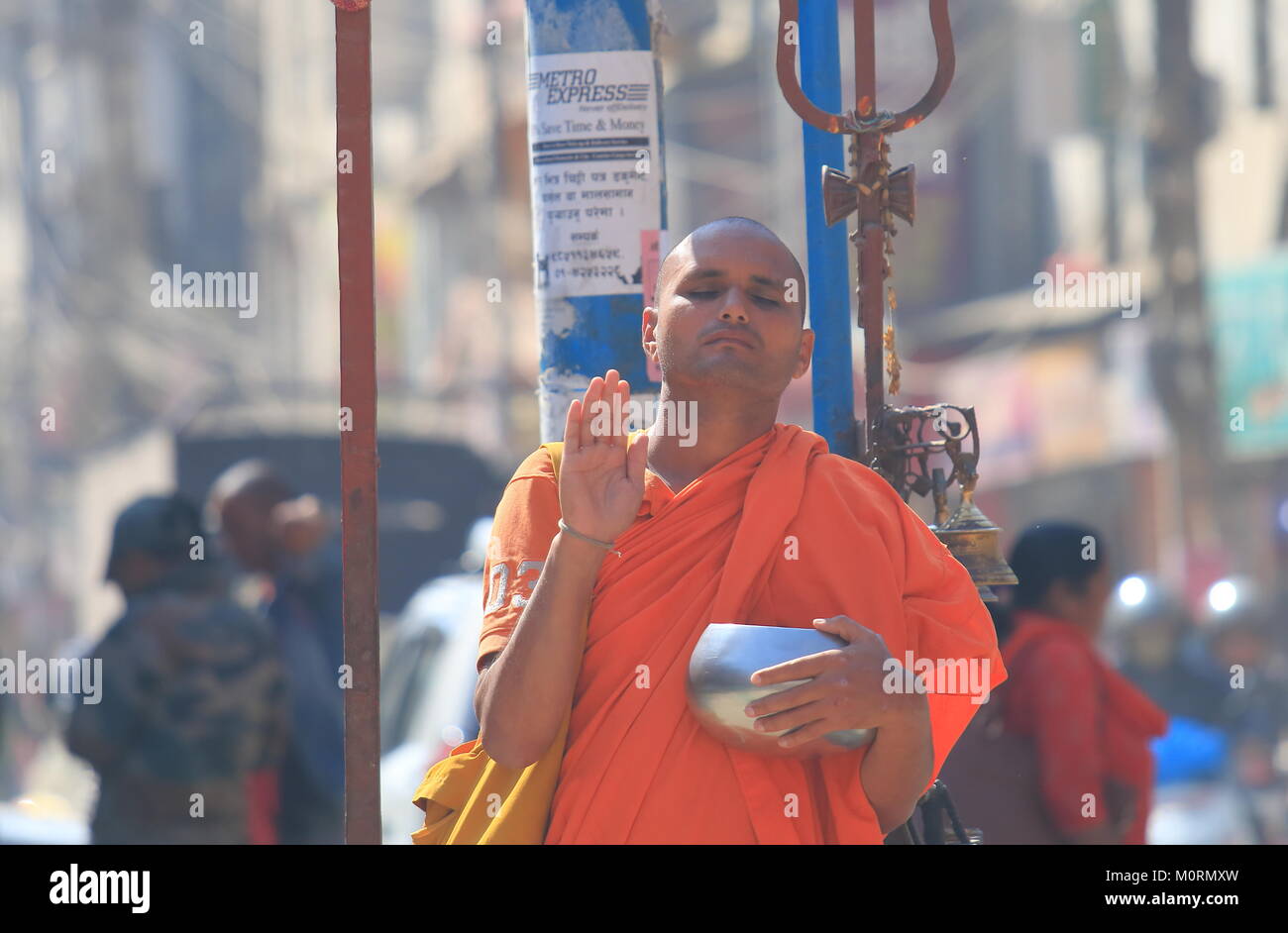 Nepali monk prays on Siddhidas Marg old street in Kathmandu Nepal Stock ...