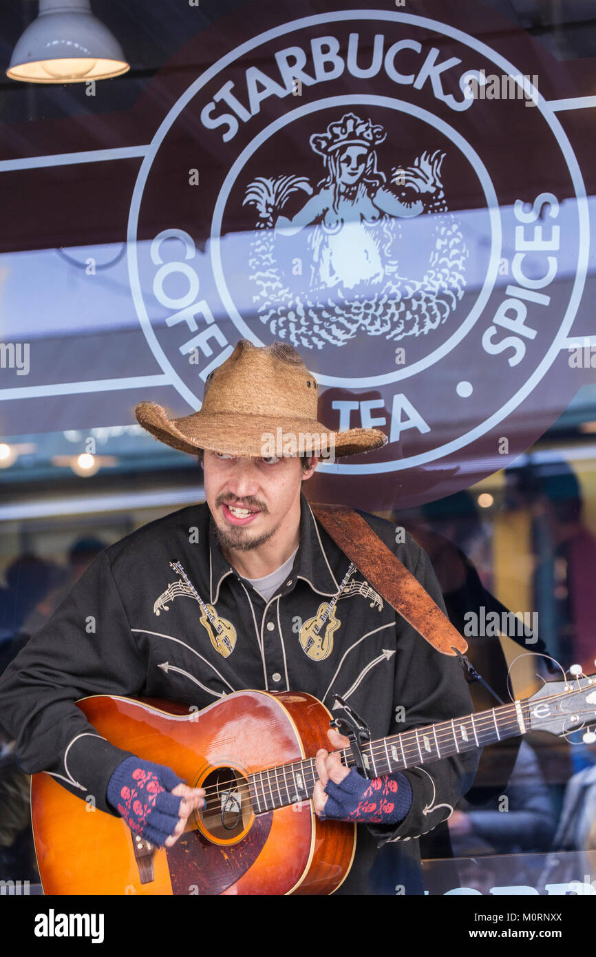 United States, Washington, Seattle, Pike Pace Market, Guitarist busking ...