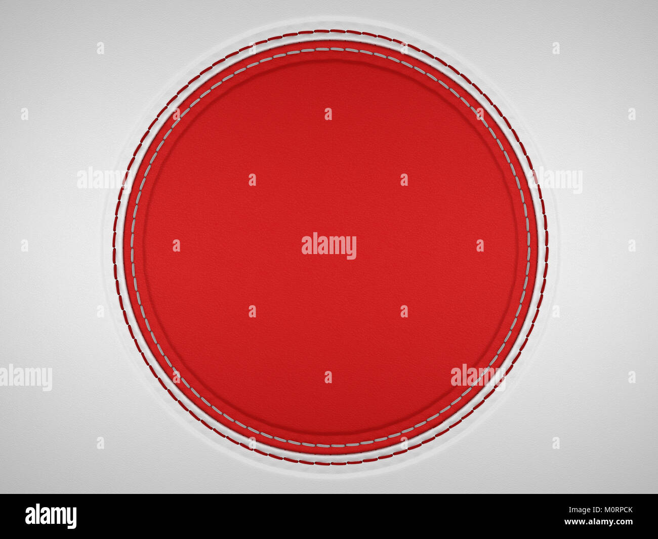 Red and grey stitched circle shape on leather background. Large ...