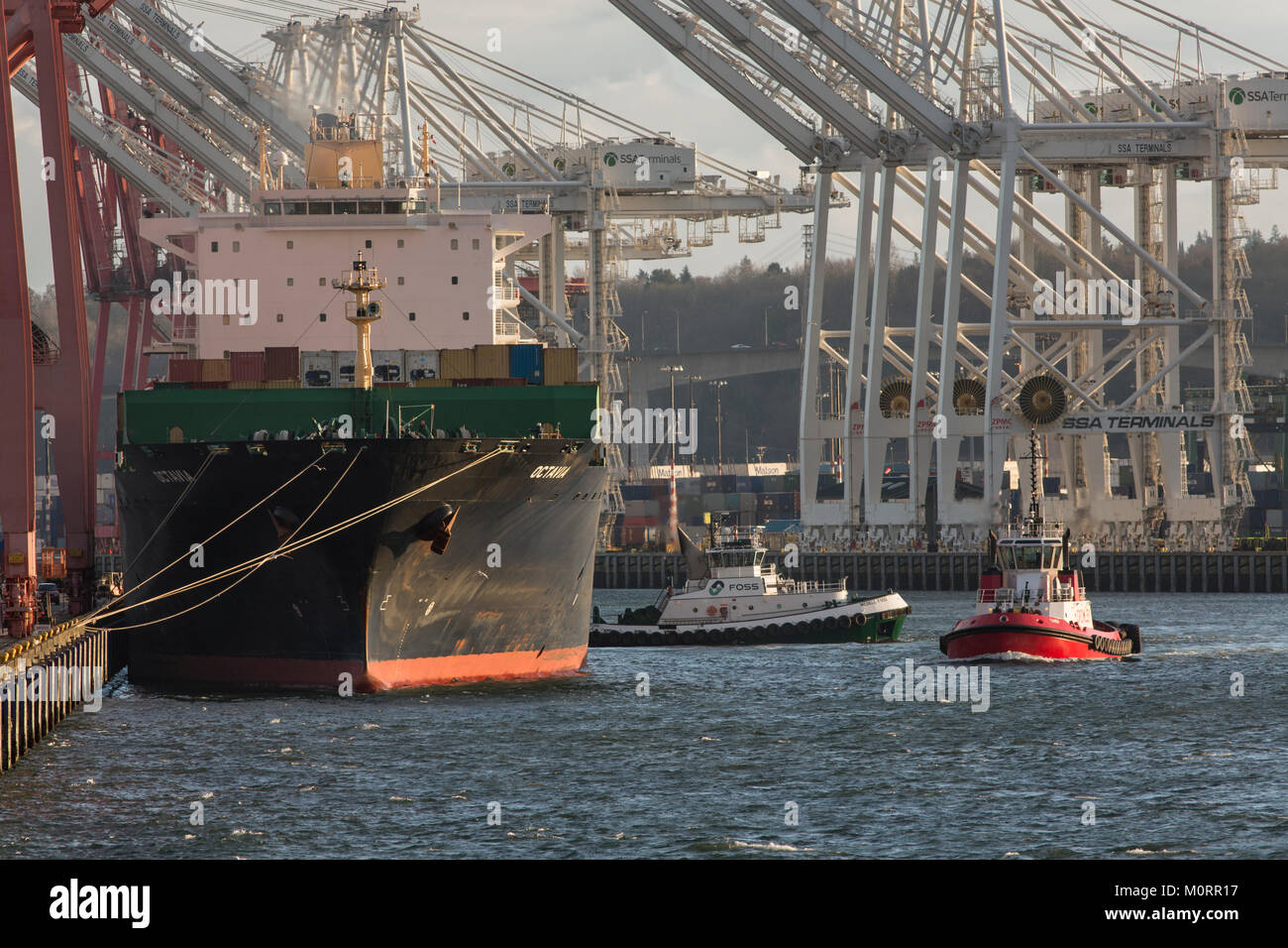 United States, Washington, Seattle, harbor, Loaded ship casting off ...