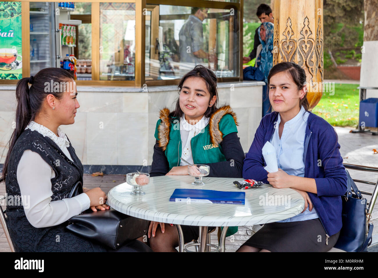 Three females eating ice cream hi-res stock photography and images - Alamy