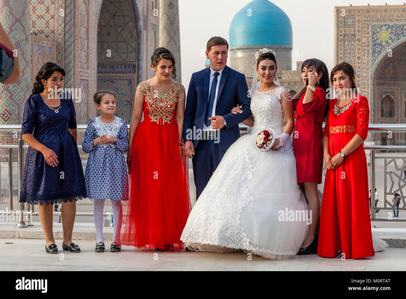 A ‘Just Married’ Young Couple Pose For Wedding Photos At The Registan ...